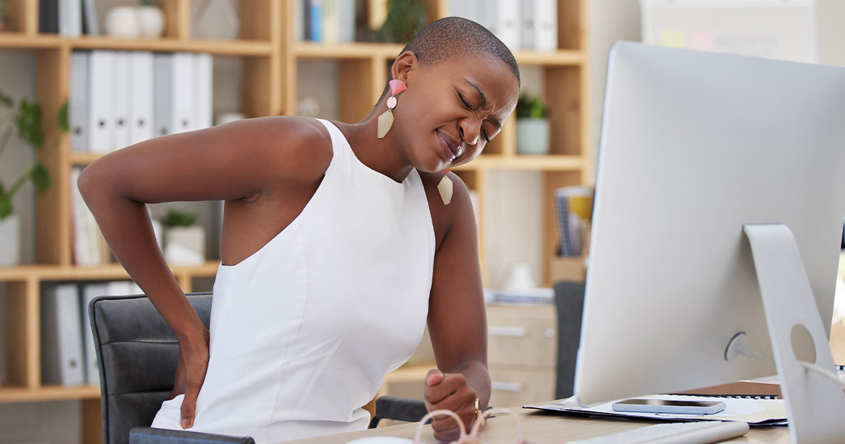Back Of Woman At Desk